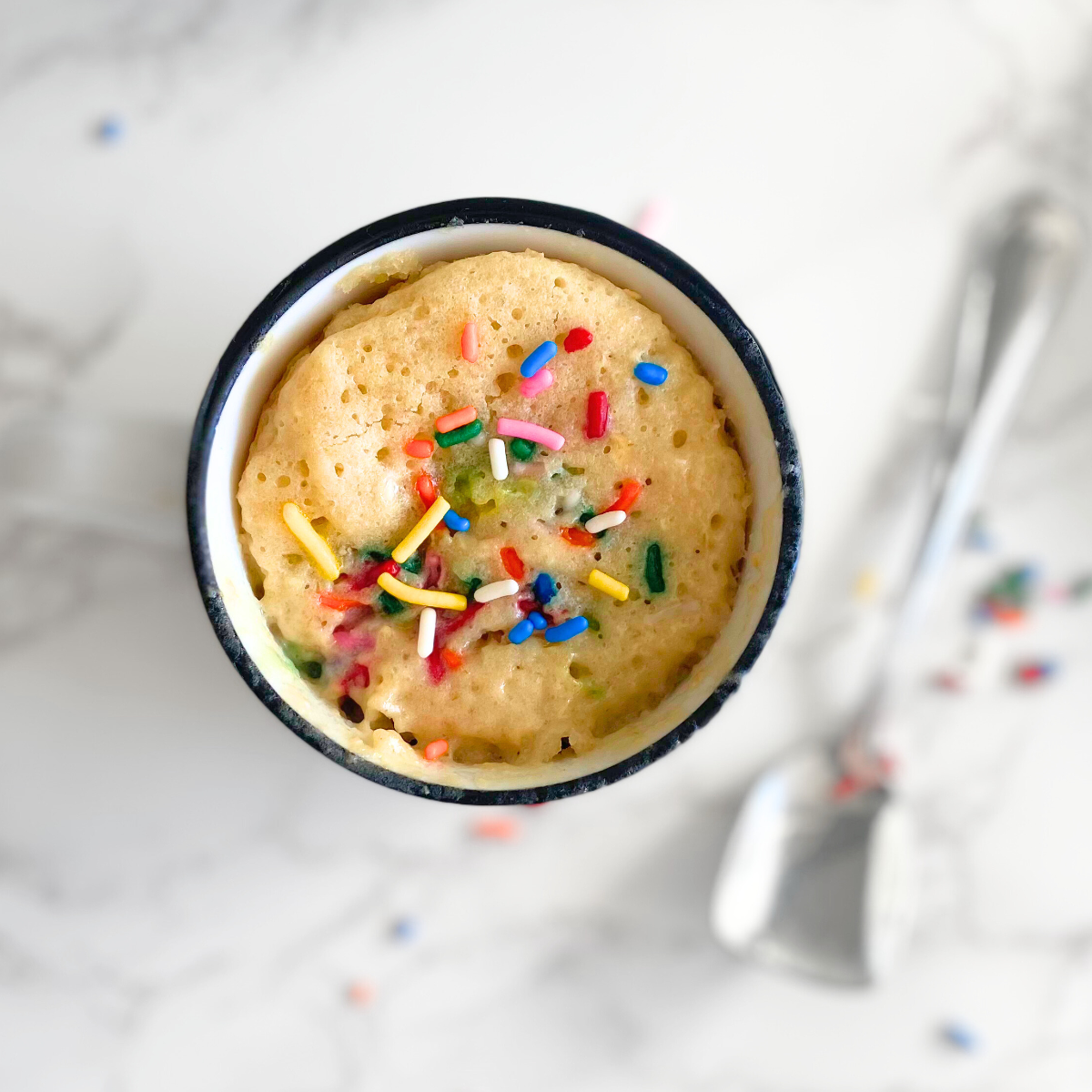 Birthday Cake Protein Mug Cake - PrettyPastelitos